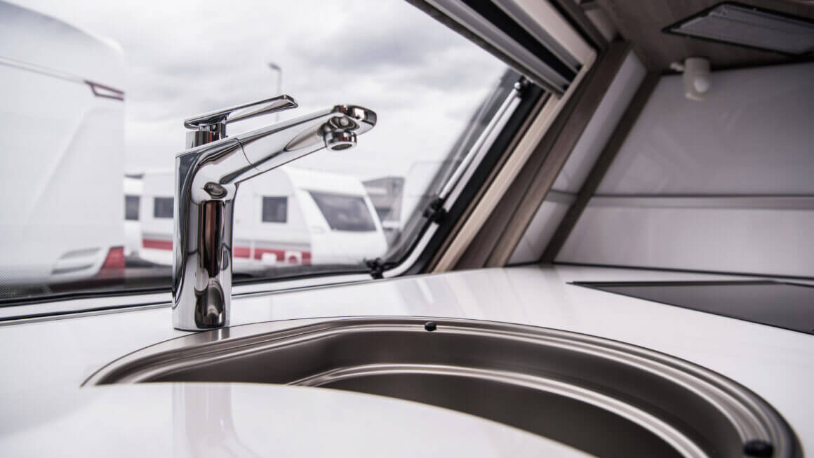 How Does an RV Freshwater System Work? - Getaway Couple