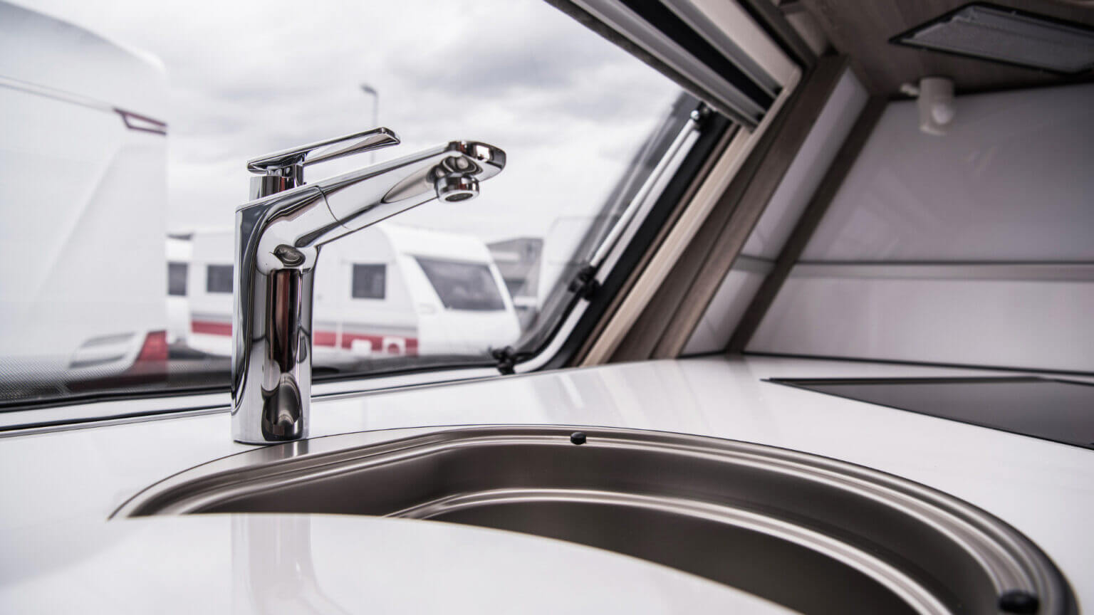 How Does an RV Freshwater System Work? - Getaway Couple