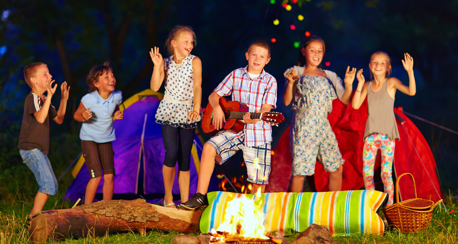 15 Campfire Games for Adults, Kids, and Parties - Getaway Couple