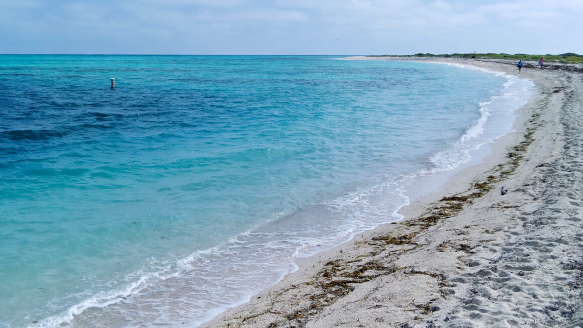 Where to Find Clear Water Beaches in Florida - Getaway Couple