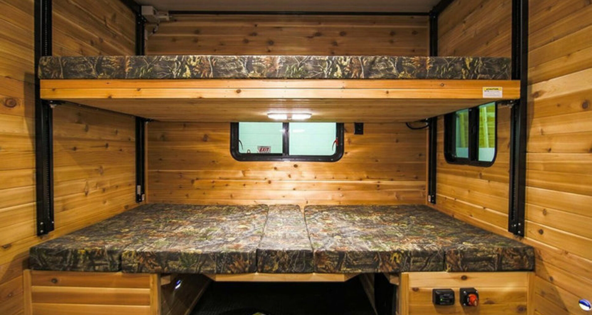 Your Guide to RV Bed Lift Systems - Getaway Couple