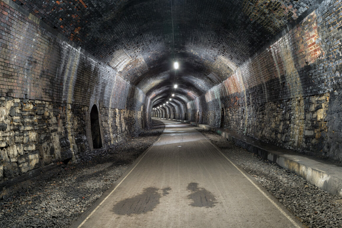 The Shameful History of Dingess Tunnel - Getaway Couple