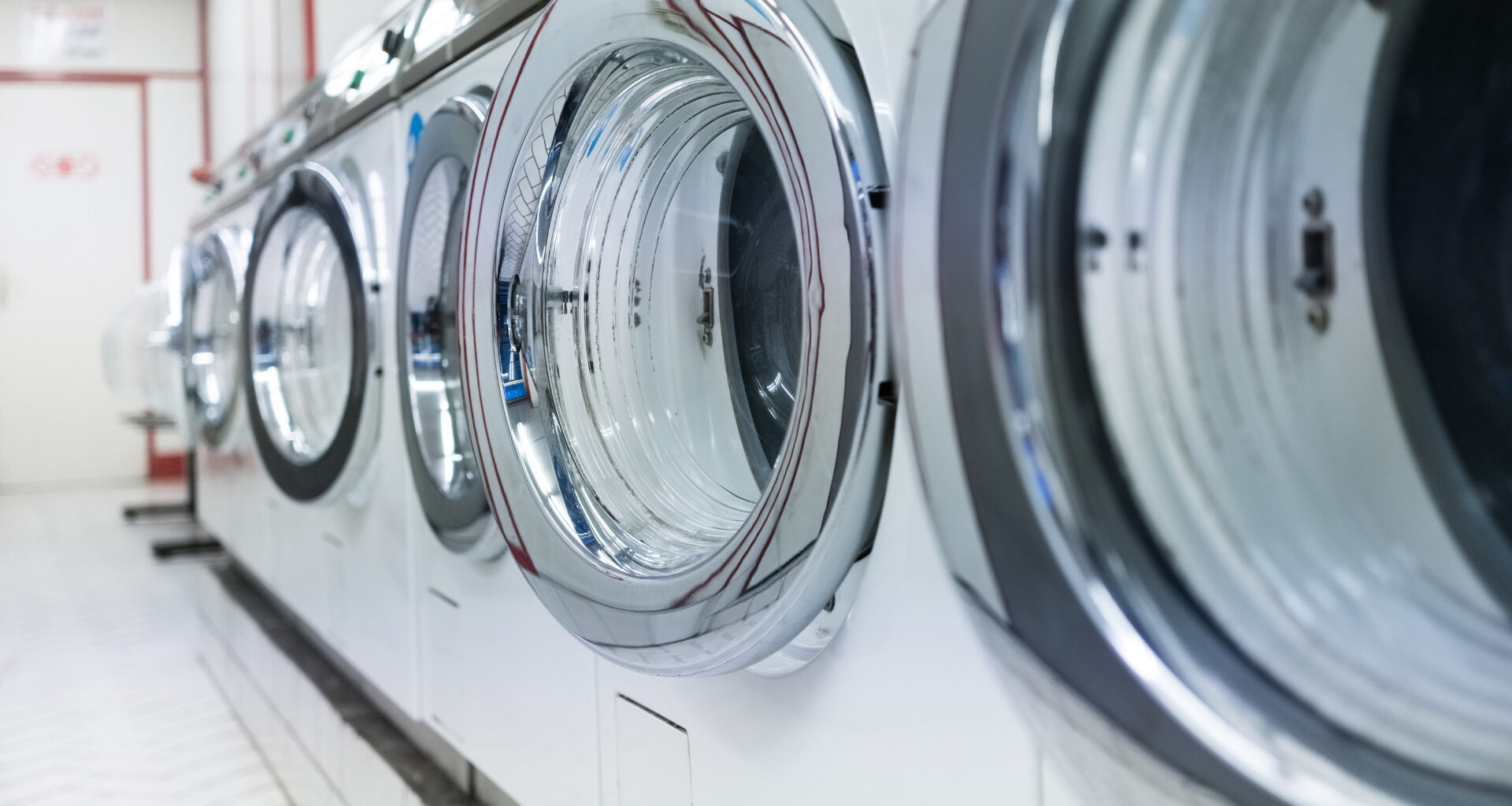 Would You Remove Someone's Clothes at a Laundromat? - Getaway Couple