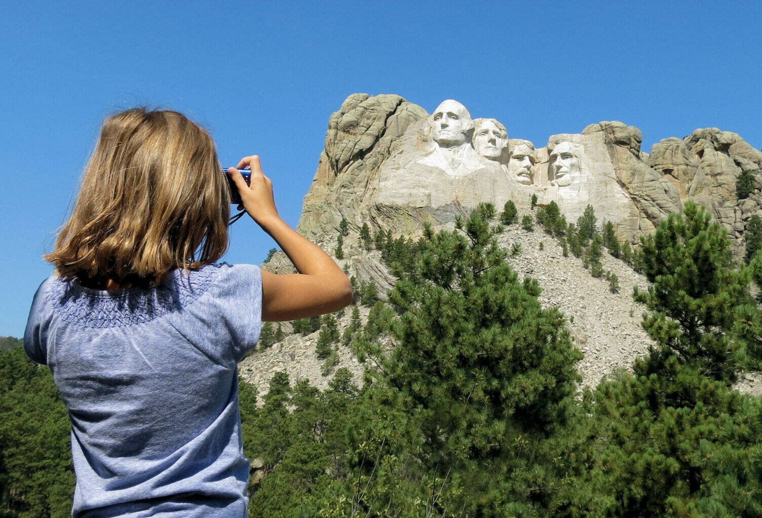 What's Really on the Backside of Mt. Rushmore? - Getaway Couple