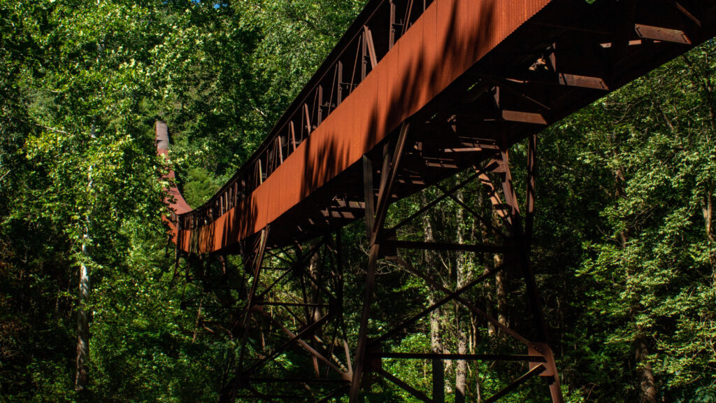 The Legend Behind the Mothman Statue - Getaway Couple