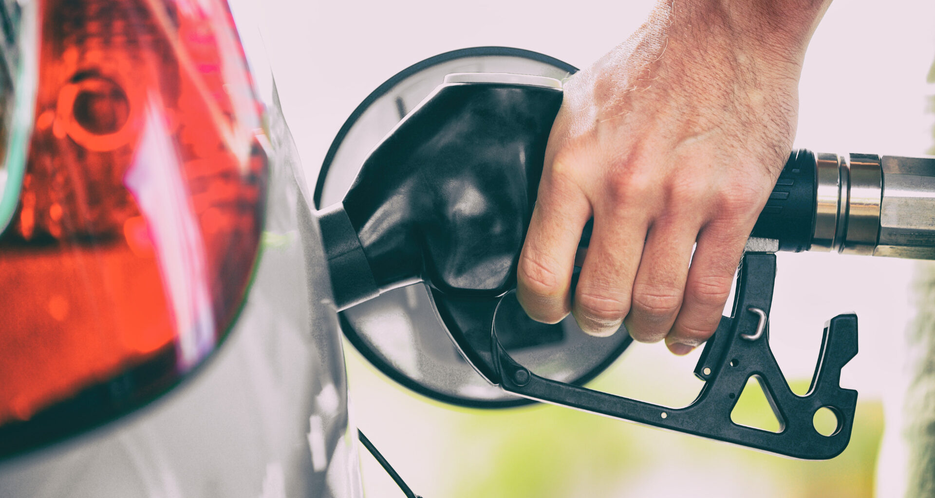 Is It Safe to Pump Gas While Your Car Is Running? - Getaway Couple
