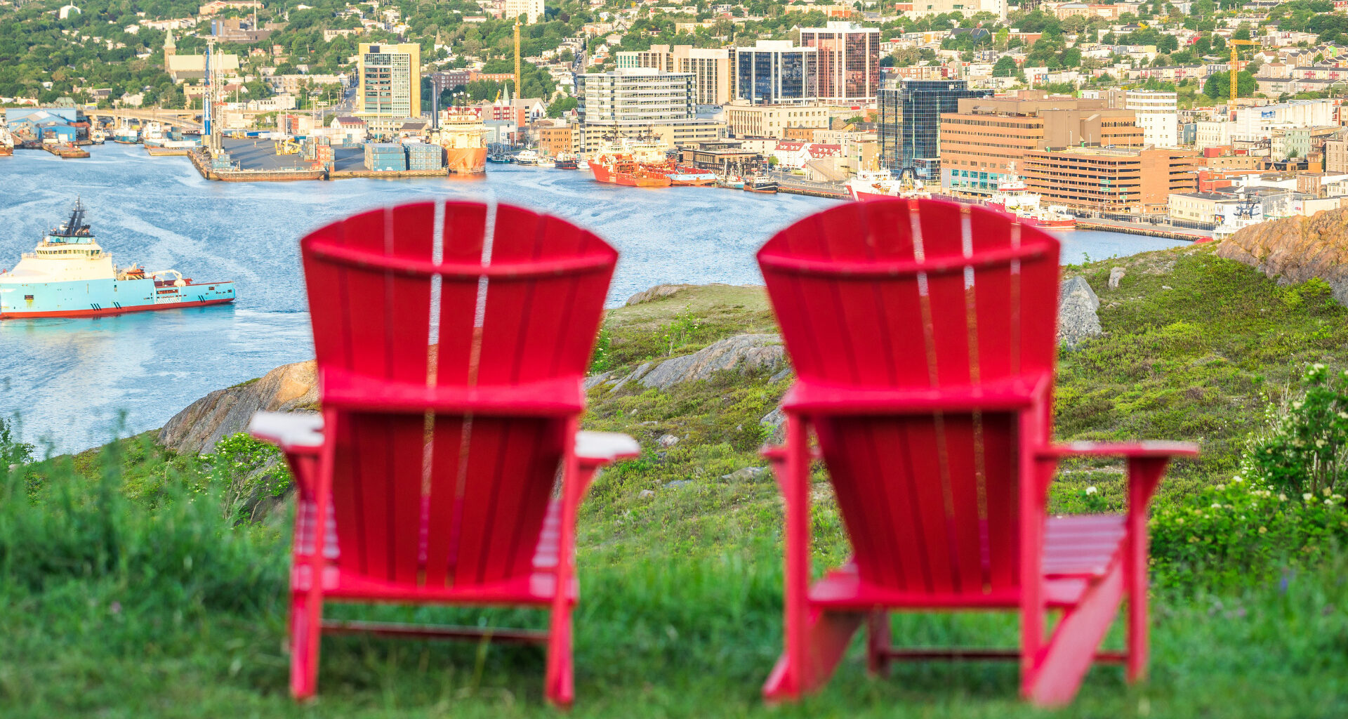 What Is the Significance of the Parks Canada Red Chairs? - Getaway Couple