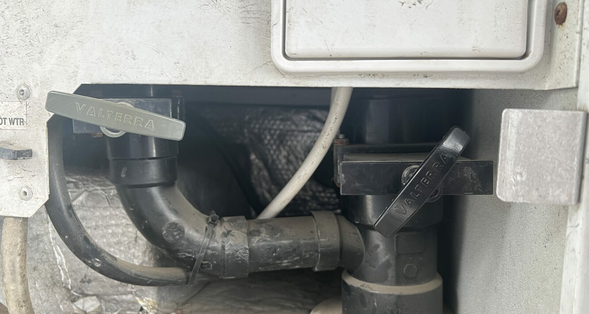 Beginner's Guide to Understanding RV Plumbing - Getaway Couple