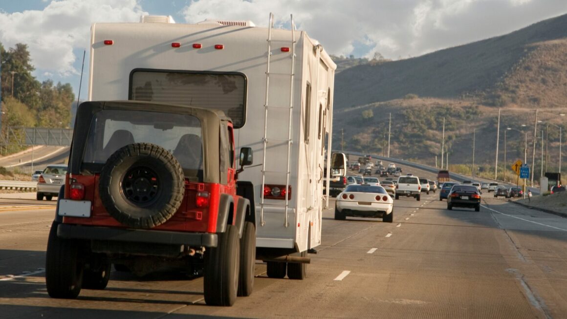The Pros and Cons of Bringing a Toad Car RVing - Getaway Couple