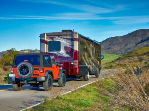The Pros and Cons of Bringing a Toad Car RVing - Getaway Couple